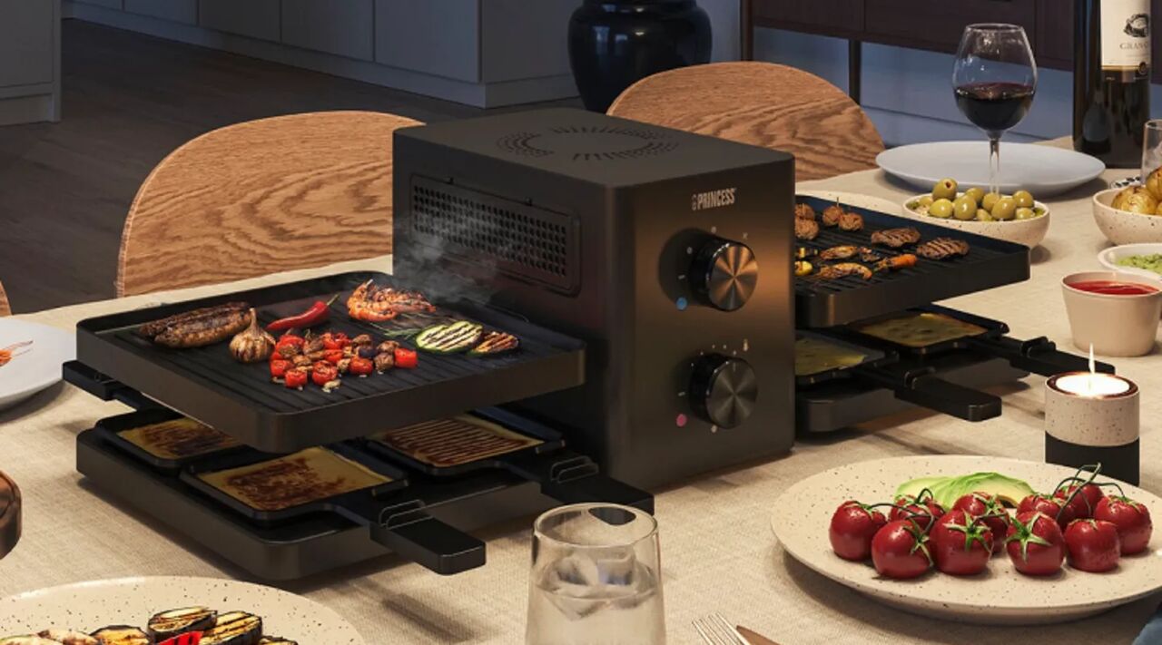Dit gourmetstel (8 personen) heeft een ingebouwde afzuiging